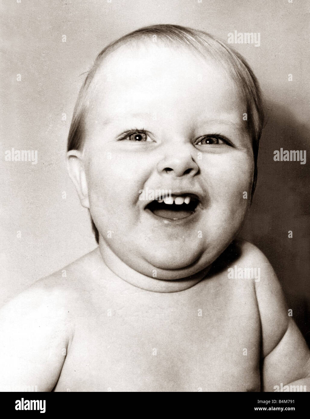 Laughing baby 1950s hi-res stock photography and images - Alamy