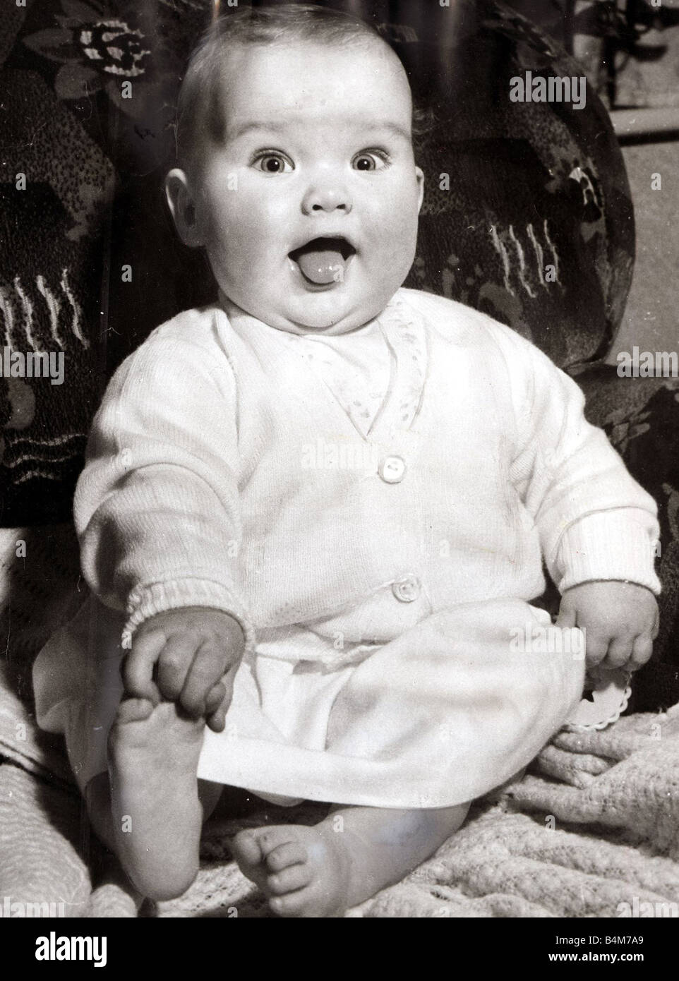 Cheeky little baby girl circa 1950 Stock Photo - Alamy
