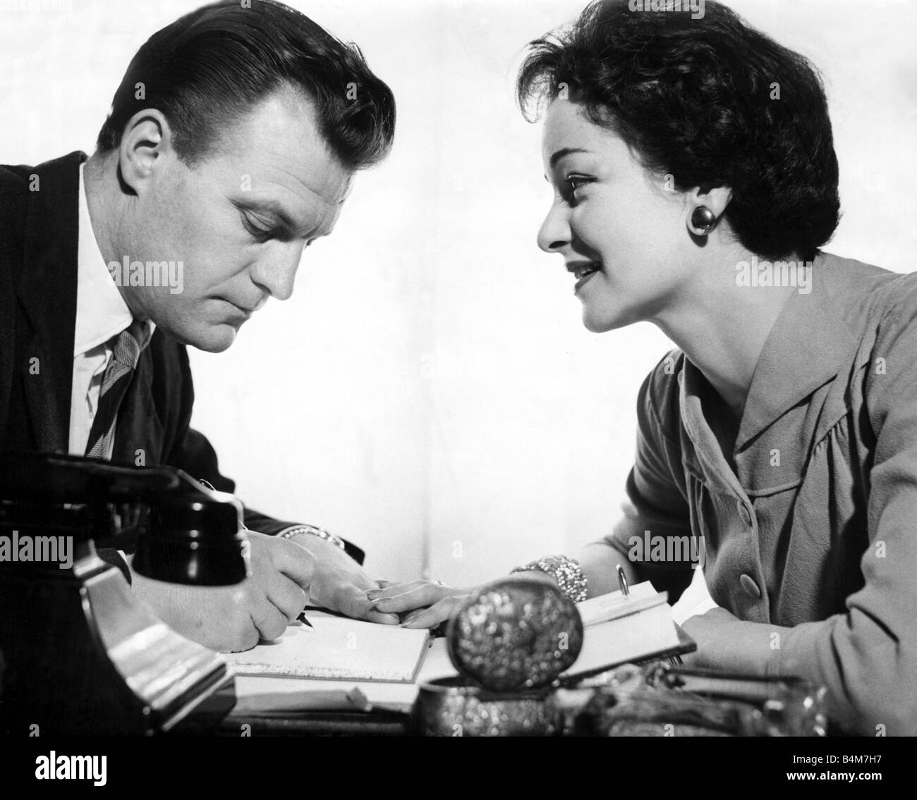 Love at the office secretary typist office worker making romantic ...