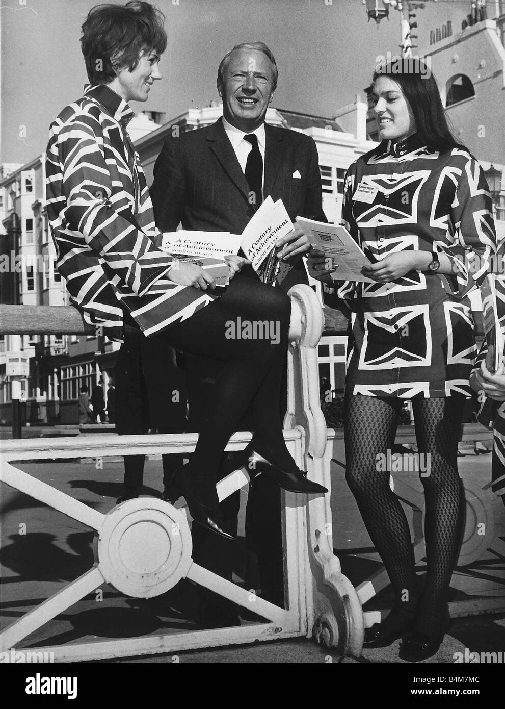 Prime Minister Edward Heath being shown new Union Jack shirts at Tory ...