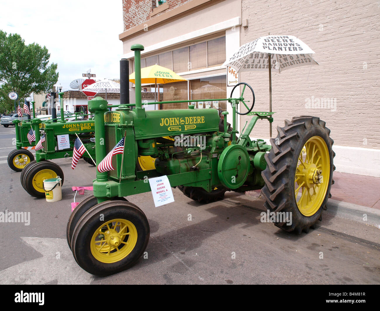 1936 John Deere Model A Tractor together with other classic tractors ...