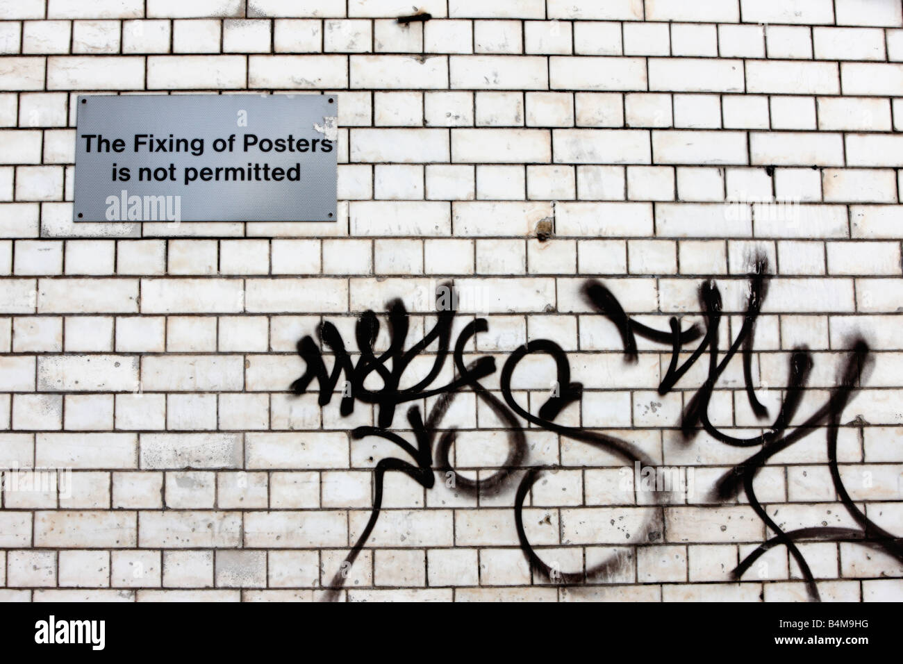 Fixing posters hi-res stock photography and images - Alamy