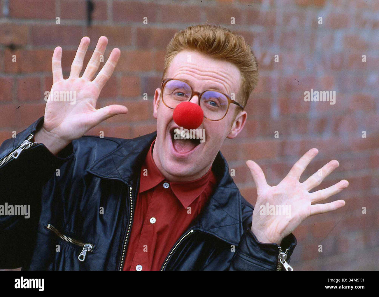 TV presenter Bryan Burnett wearing a red nose 1990 Stock Photo - Alamy