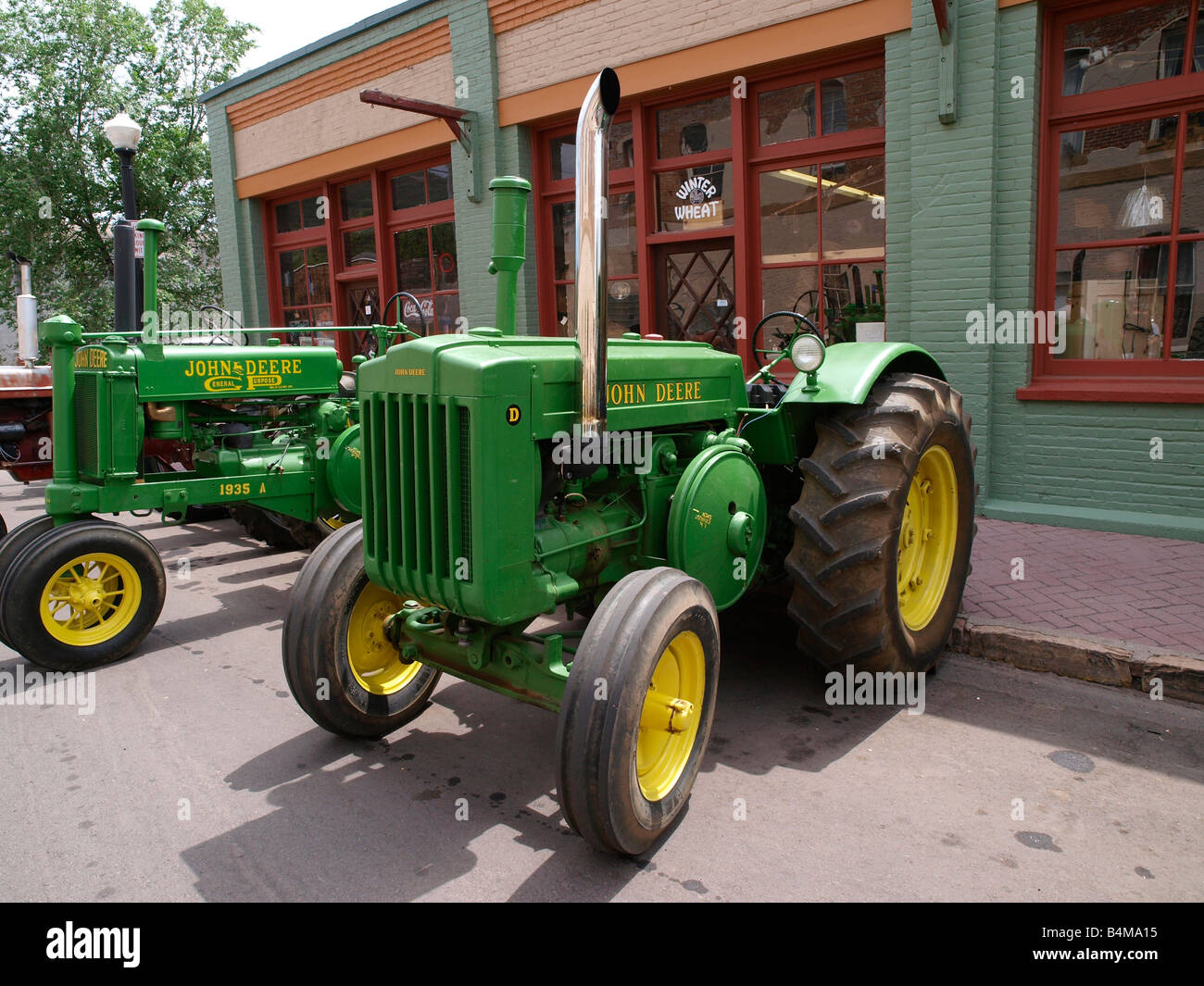 John Deere Model D Tractor together with other classic tractors decked ...