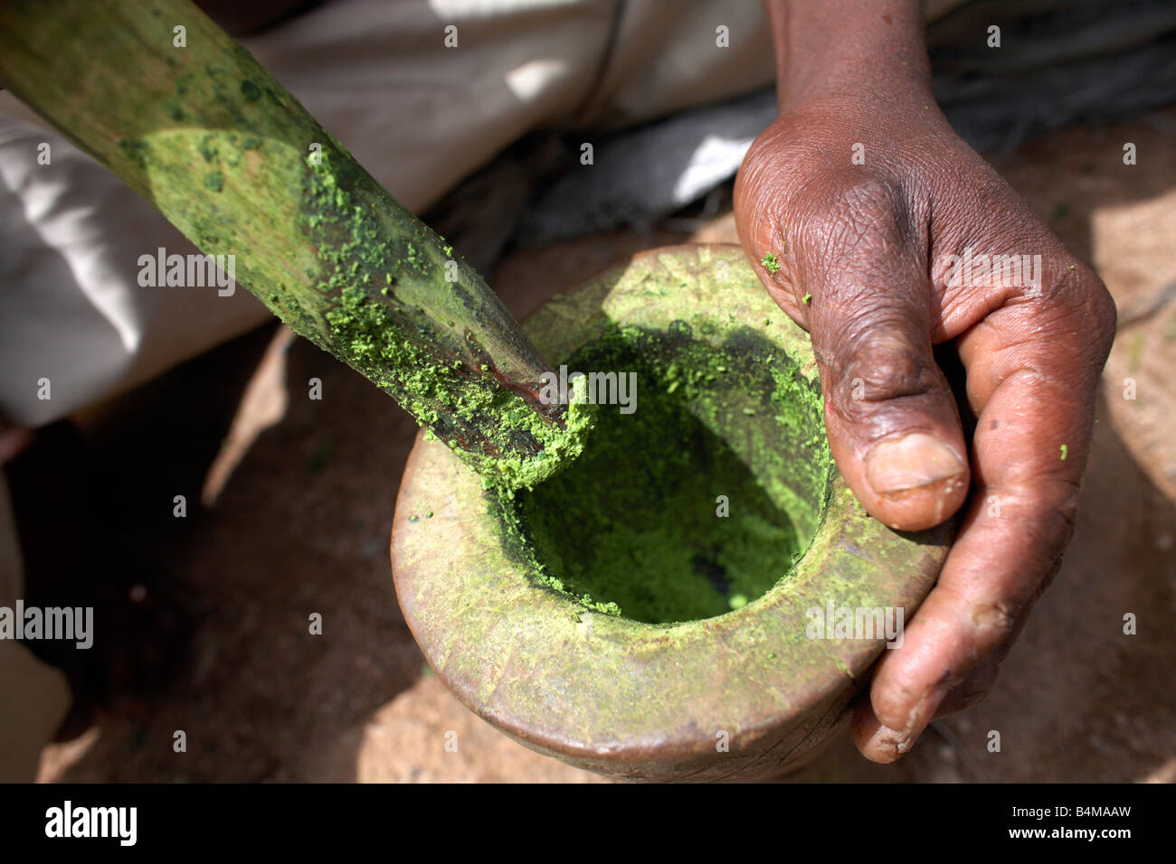 Mixing a chat paste in Harar, Ethiopia Stock Photo - Alamy