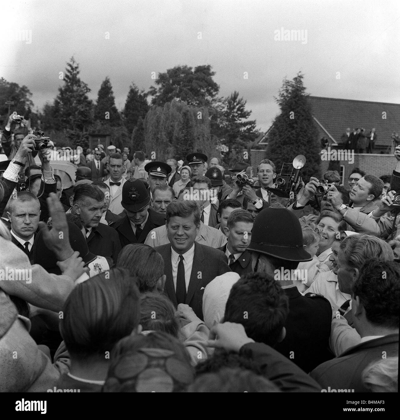 President John F Kennedy on a vist to England July 1963 walks through a ...