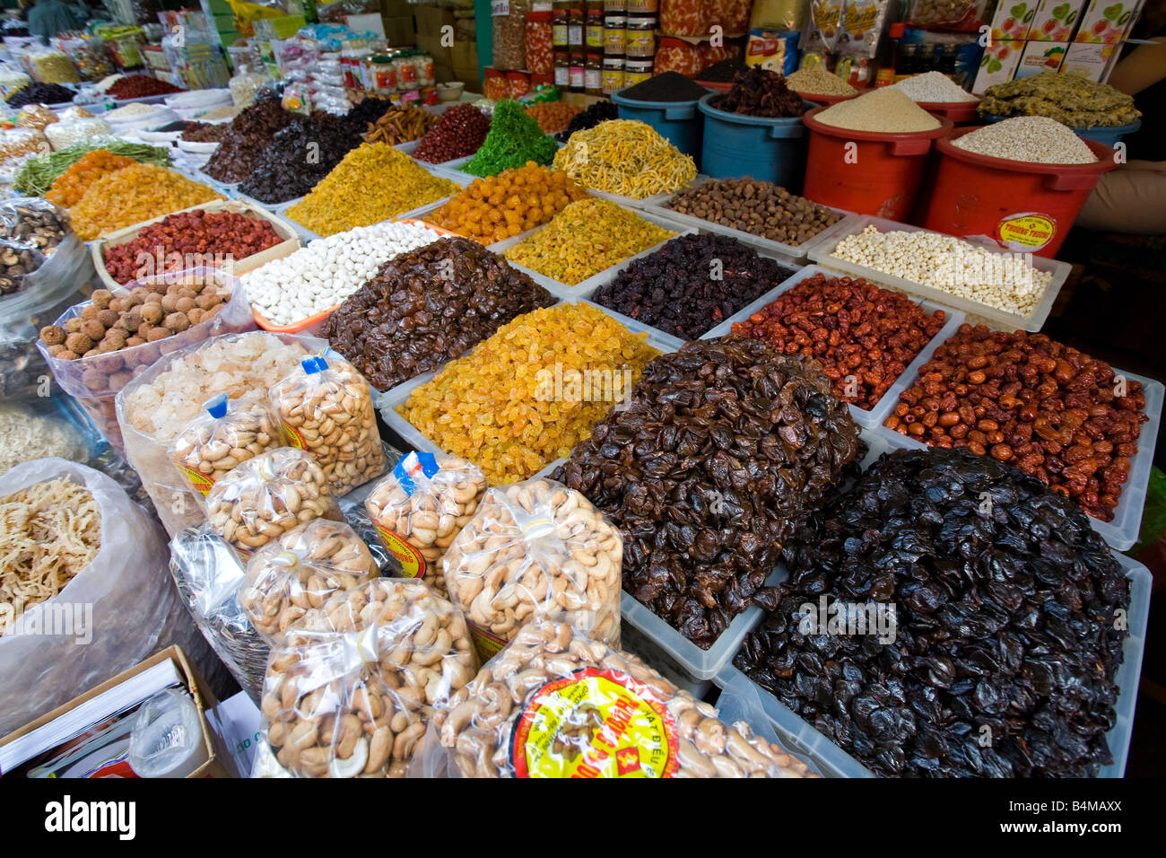 A stand selling various preserved fruits at local market Stock Photo ...
