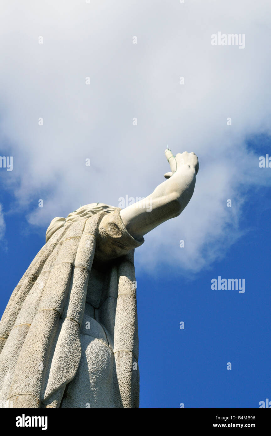 Right hand of large statue pointing index finger towards sky Stock ...