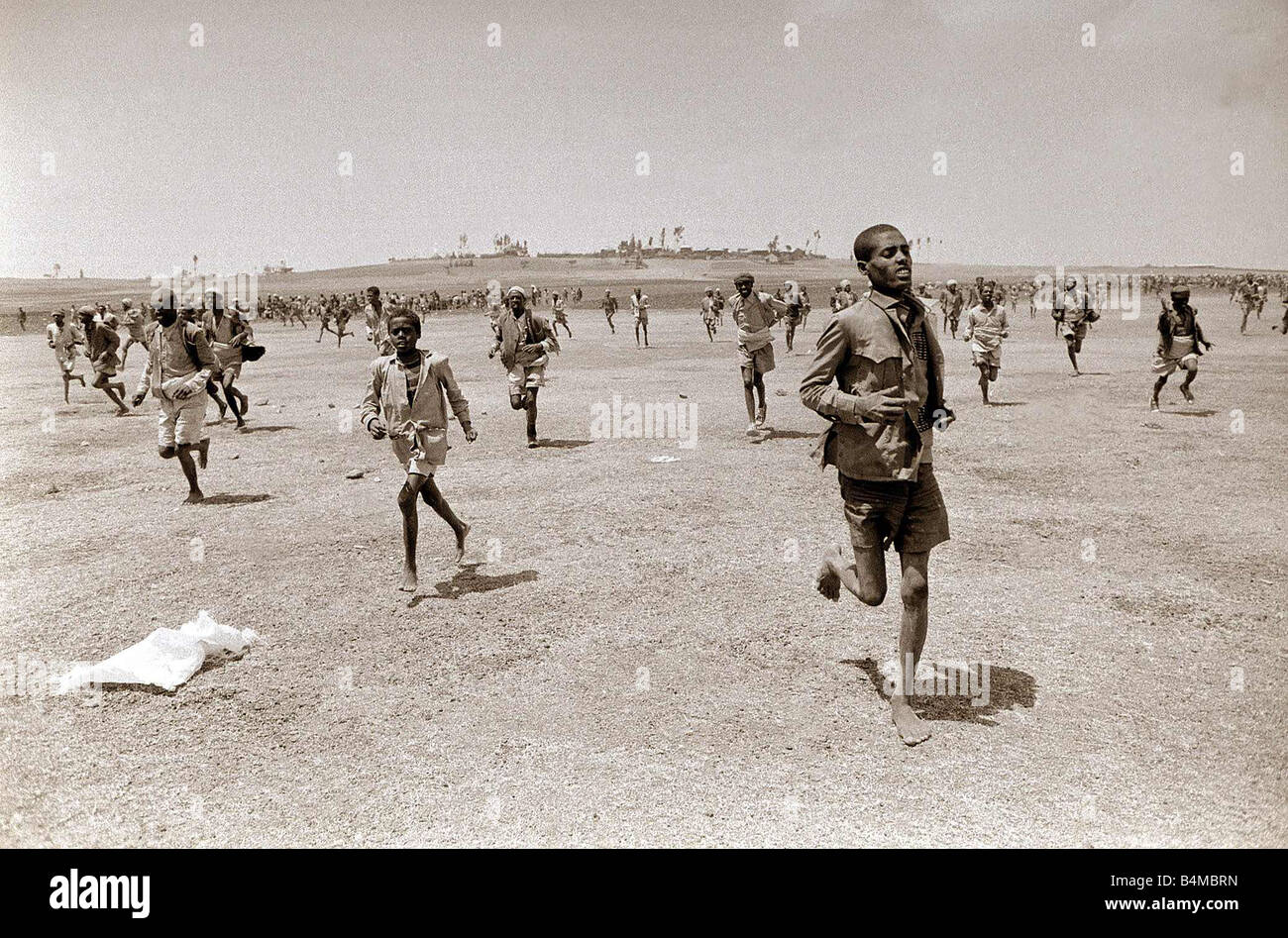 Ethiopia Famine June 1985 Bati 6 months on Locals running across a ...