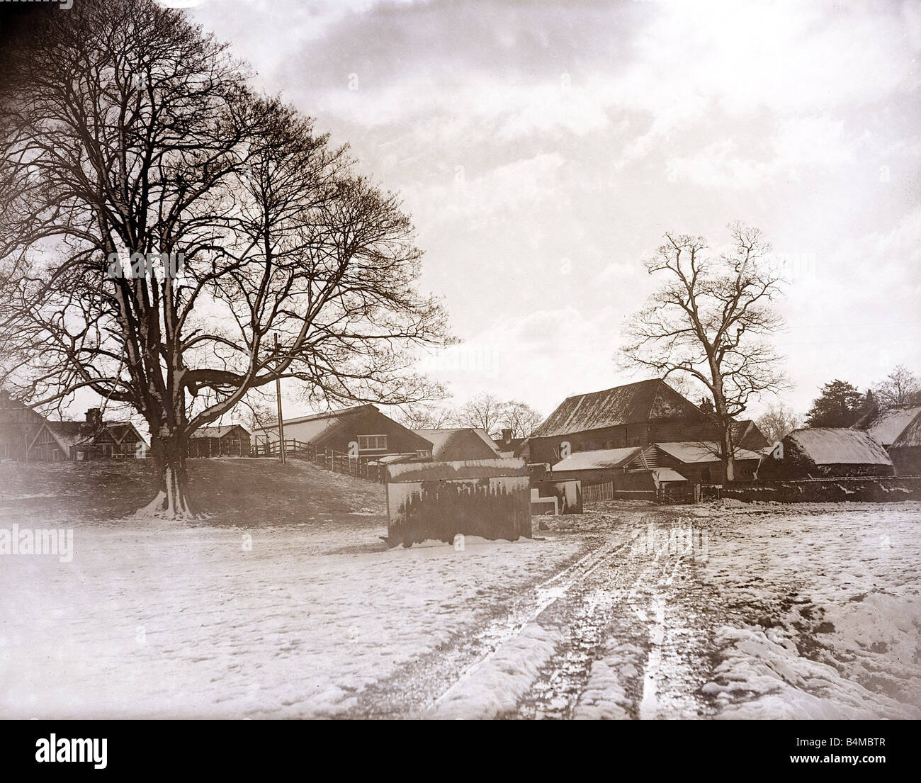 Landscape A Farmhouse in the snow Stock Photo - Alamy