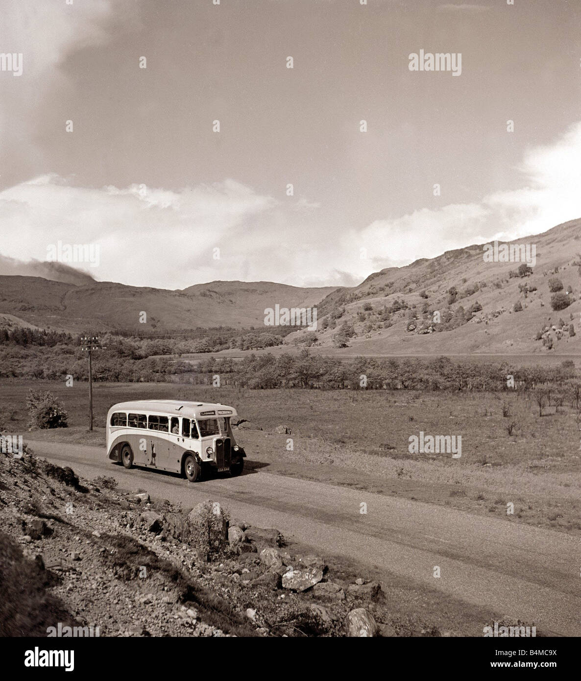 Bus journey in highlands of Scotland circa 1950s transport road rural ...