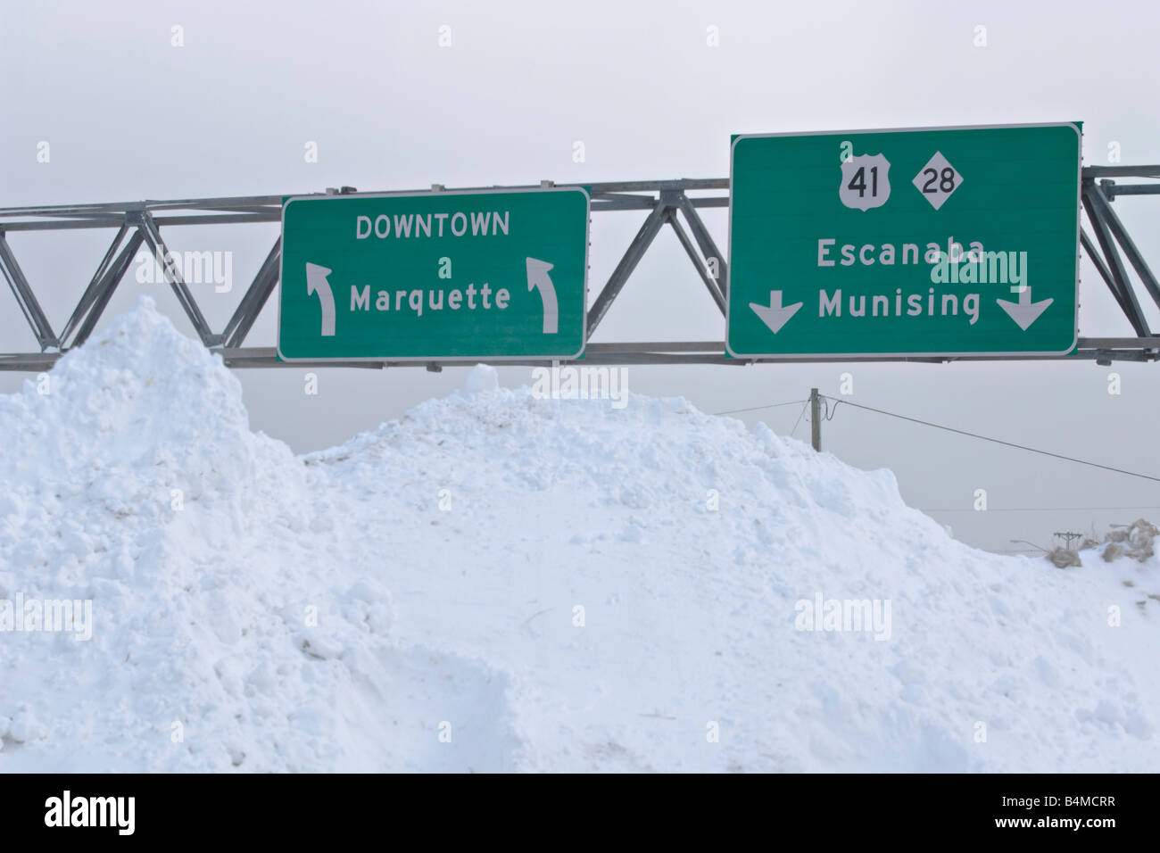 Highway signs for the cities of Marquette Munising and Escanaba in the ...