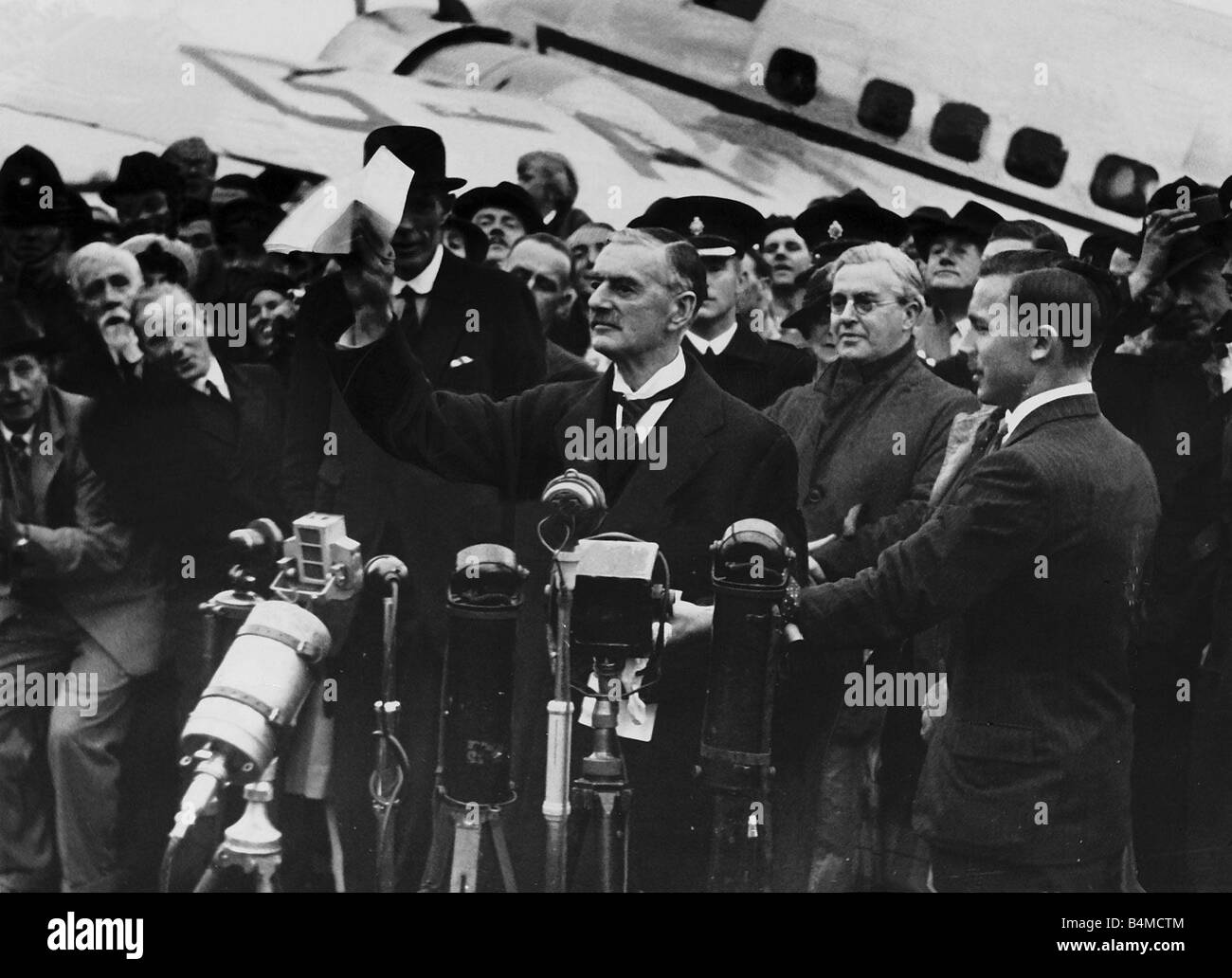 Neville Chamberlain waives Munich peace treaty after returning from ...