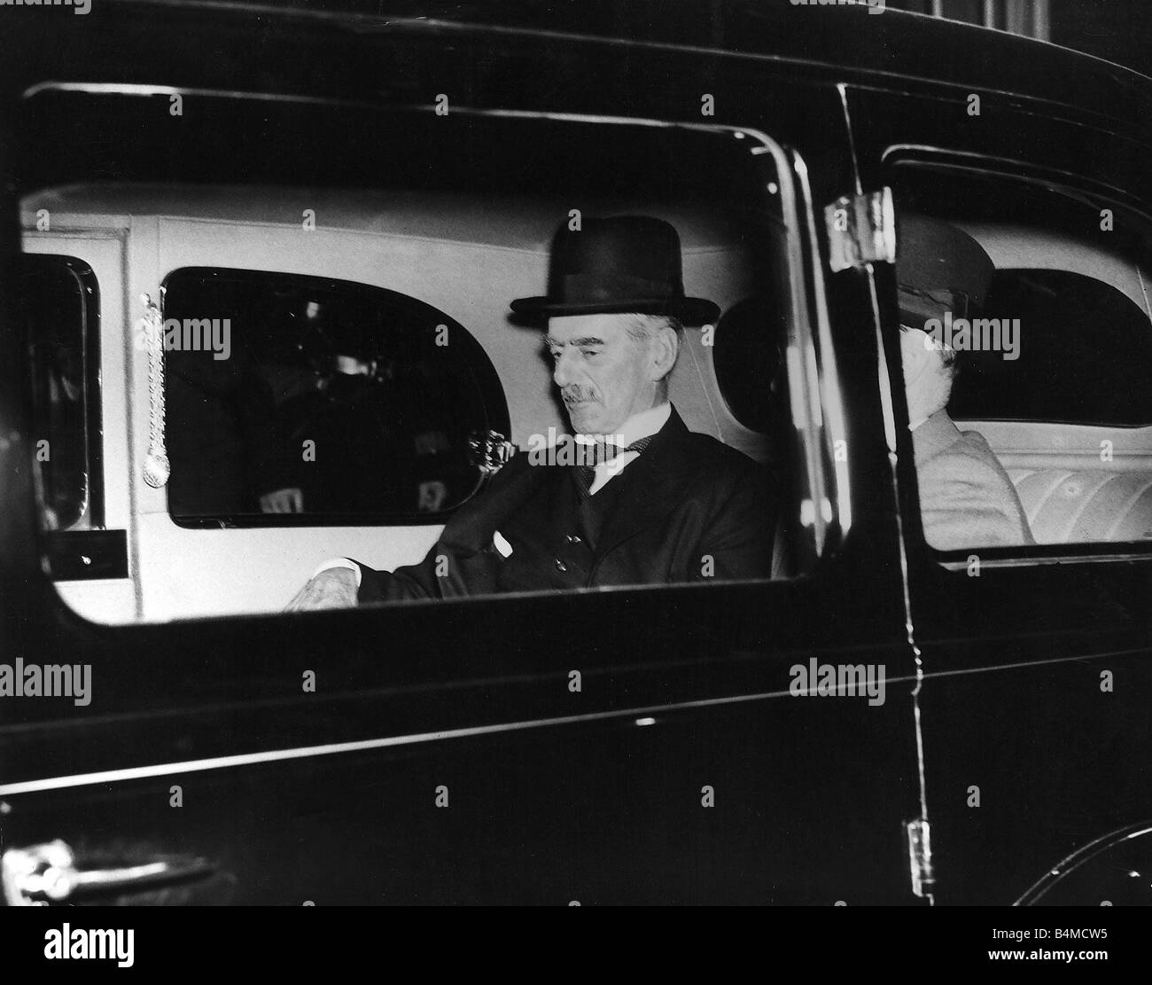 Neville Chamberlain the Prime Minister in his car on his way to see the ...