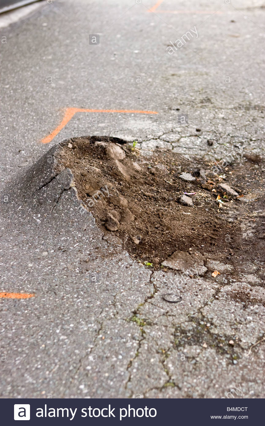 Damaged Pavement High Resolution Stock Photography and Images - Alamy