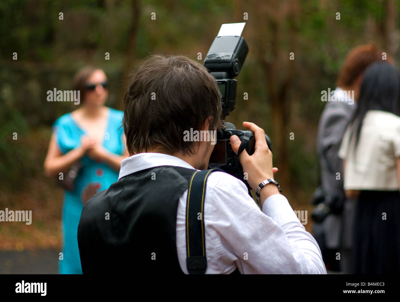 Man taking photographs Stock Photo - Alamy