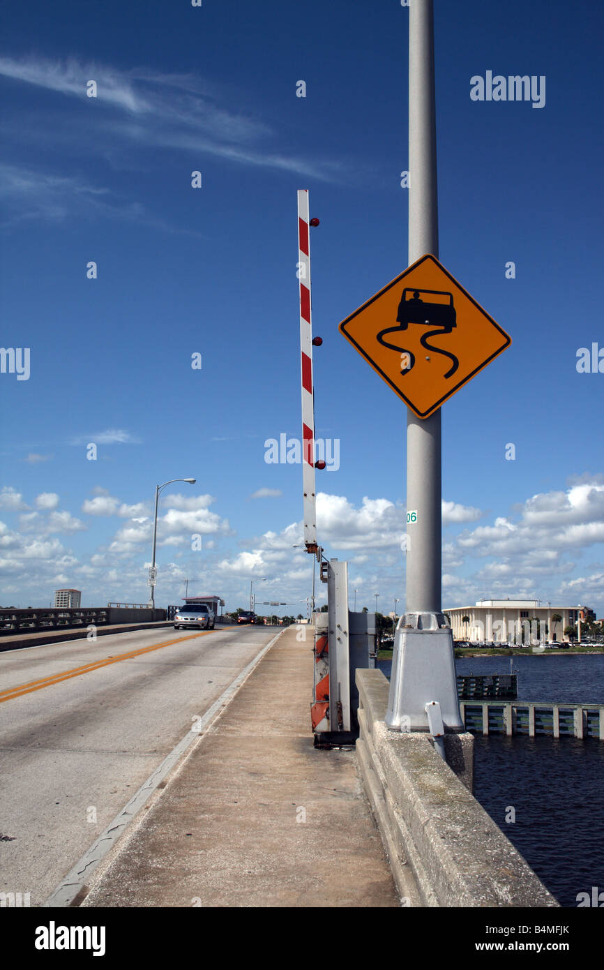 Slippery When Wet Warning sign on the Silver Beach bridge in Daytona ...