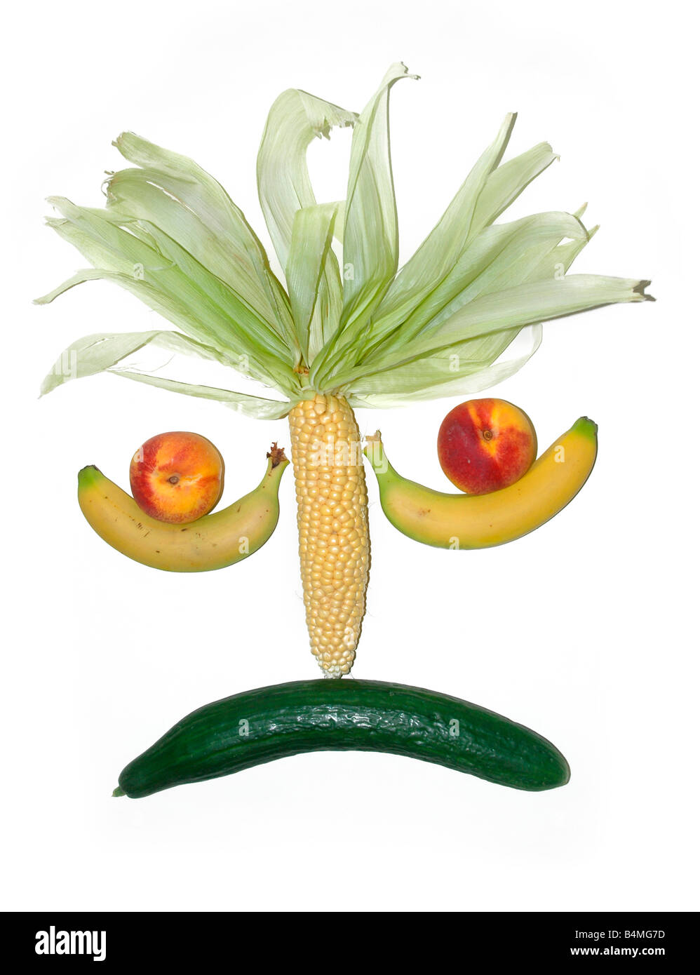 A grumpy unhappy face made with a variety of fruit and veg Stock Photo ...