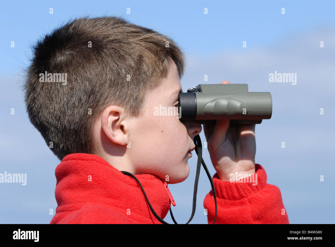 boy using binoculars Stock Photo - Alamy