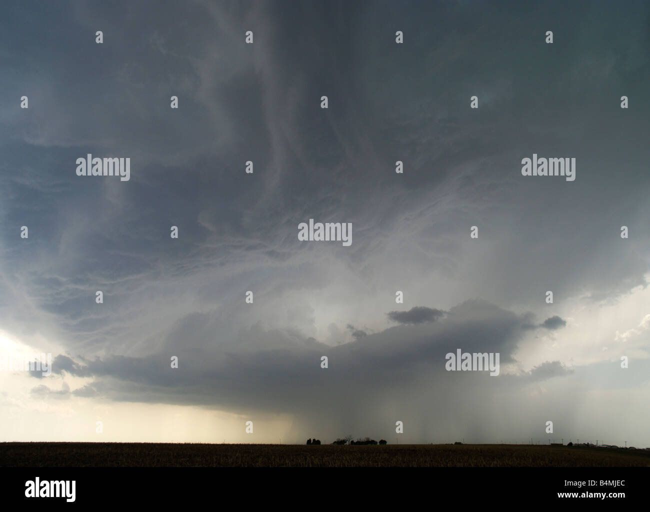 Severe thunderstorm approaches a farm in northwestern Kansas Stock ...