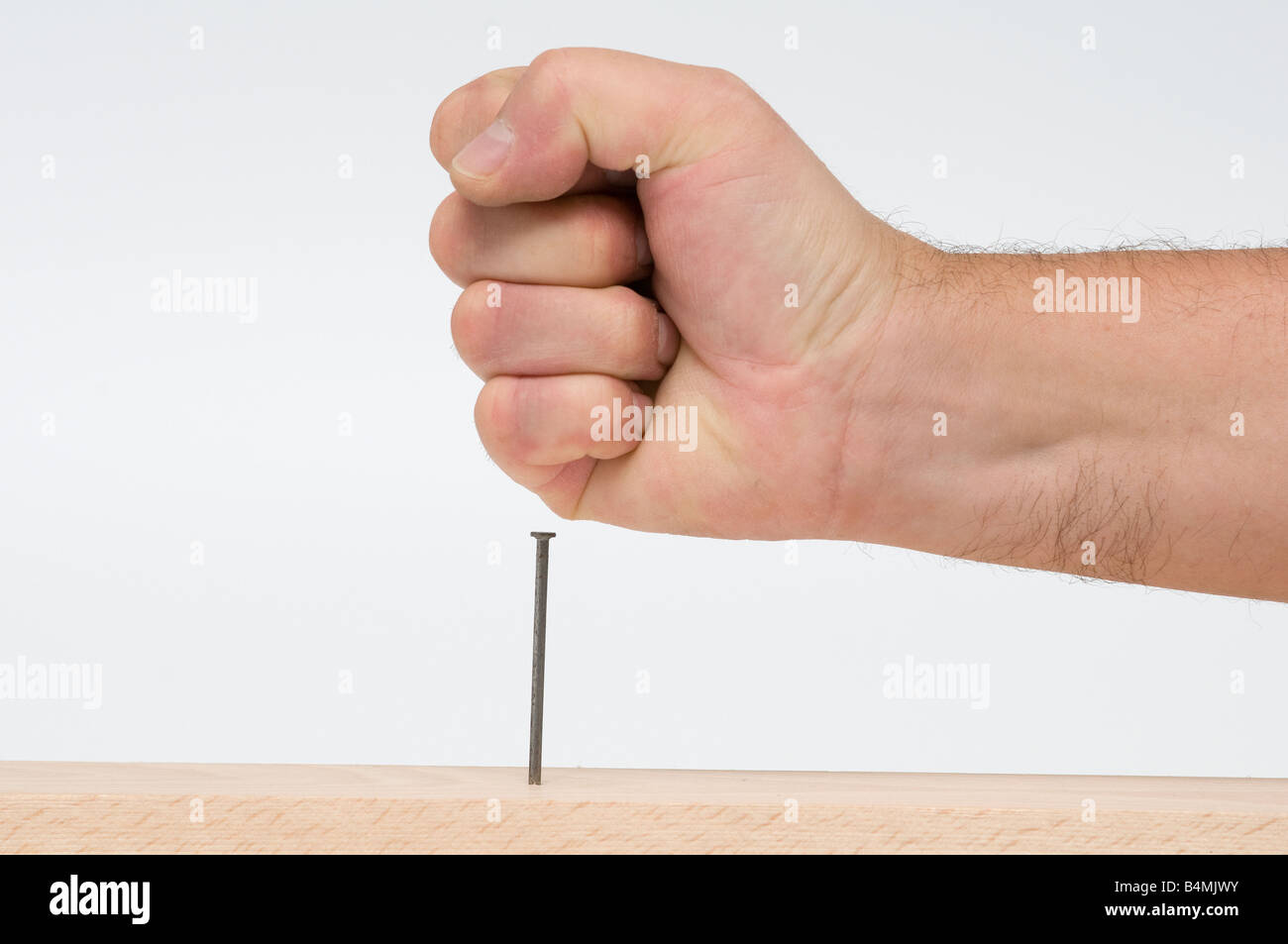Man driving nail hi-res stock photography and images - Alamy