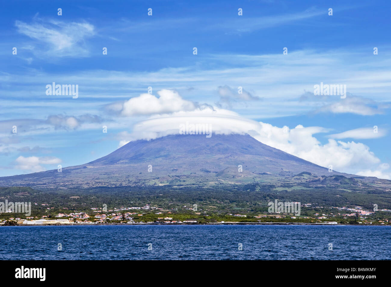 Beautiful cloud formation over Pico volcanic mountain view from the sea ...