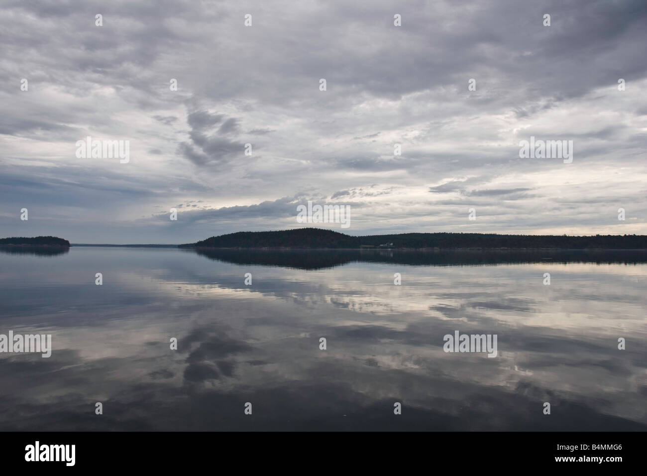 Grey clouds reflecting reflections water hi-res stock photography and ...