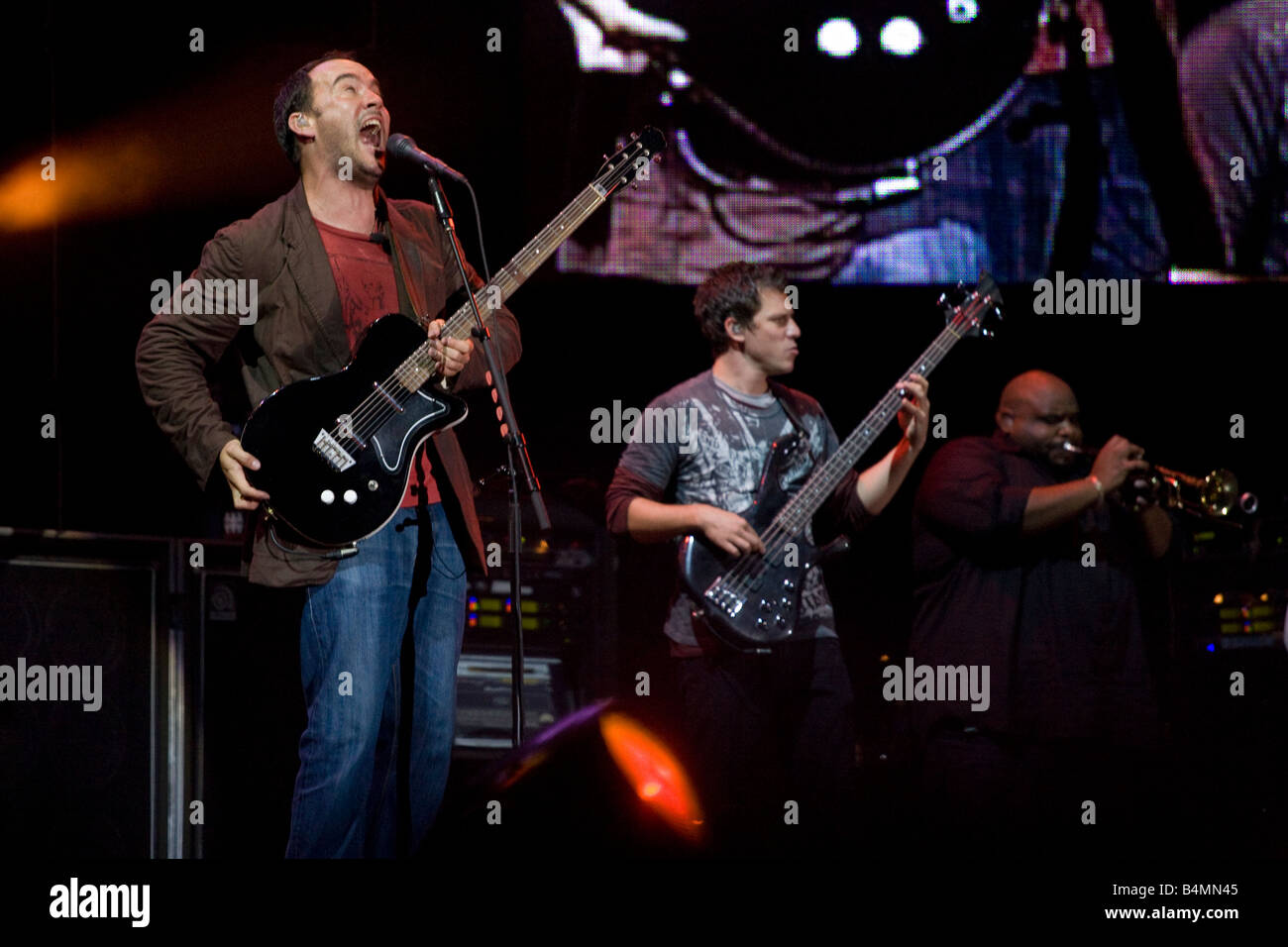 Dave Mathews playing guitar and singing loud Black White Stock Photo ...