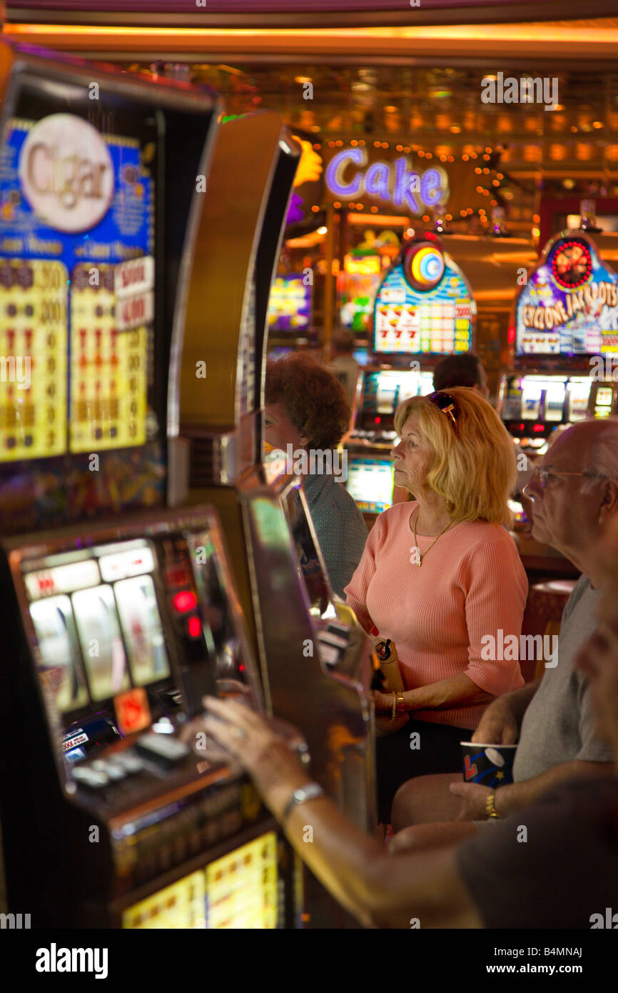 Woman playing on machines hi-res stock photography and images - Alamy