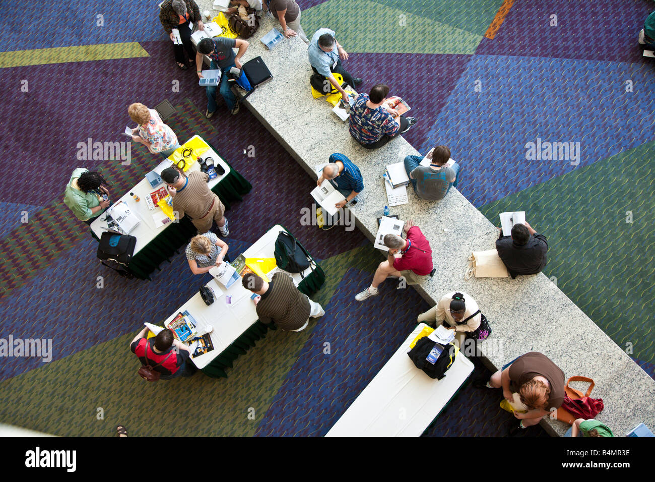 Conference attendees from above preparing for day of events Stock Photo ...