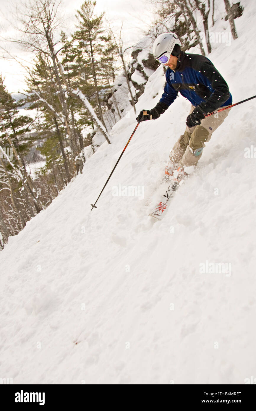 An alpine skier skis the extreme backcountry section of Mount Bohemia ...