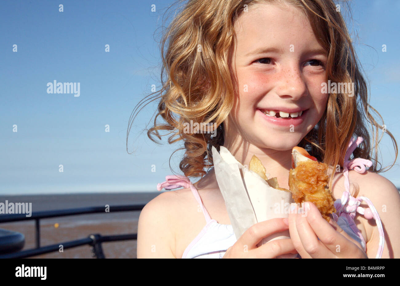 Girl Eating Fish Chips Seaside High Resolution Stock Photography and ...