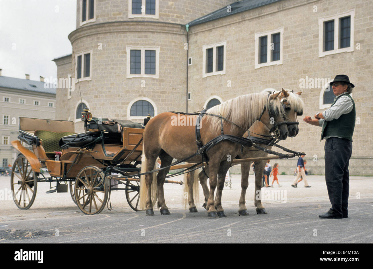 Fiaker and driver at Residenzplatz in Salzburg Austria Stock Photo - Alamy