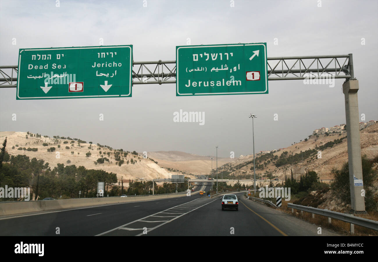 Road signs near the wall Israel is building around the west bank ...