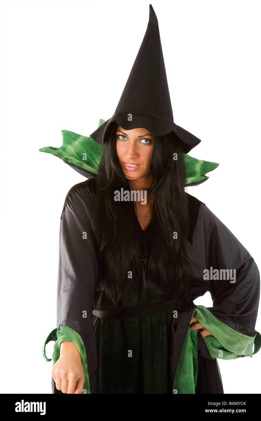 pretty woman with blue eyes in witch dress with hat Stock Photo - Alamy