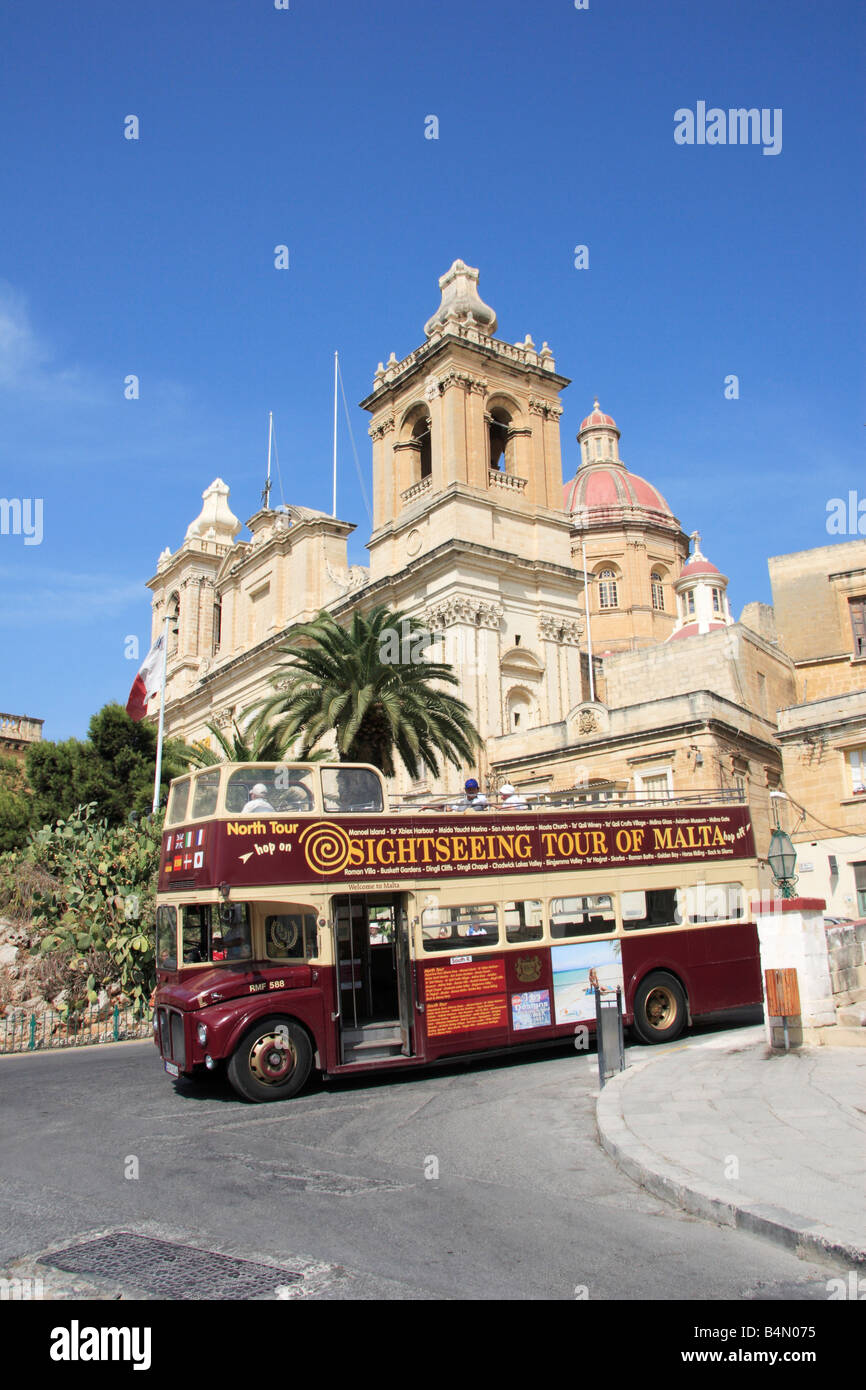 A Sightseeing Tour Bus in Vittoriosa, Malta Stock Photo - Alamy