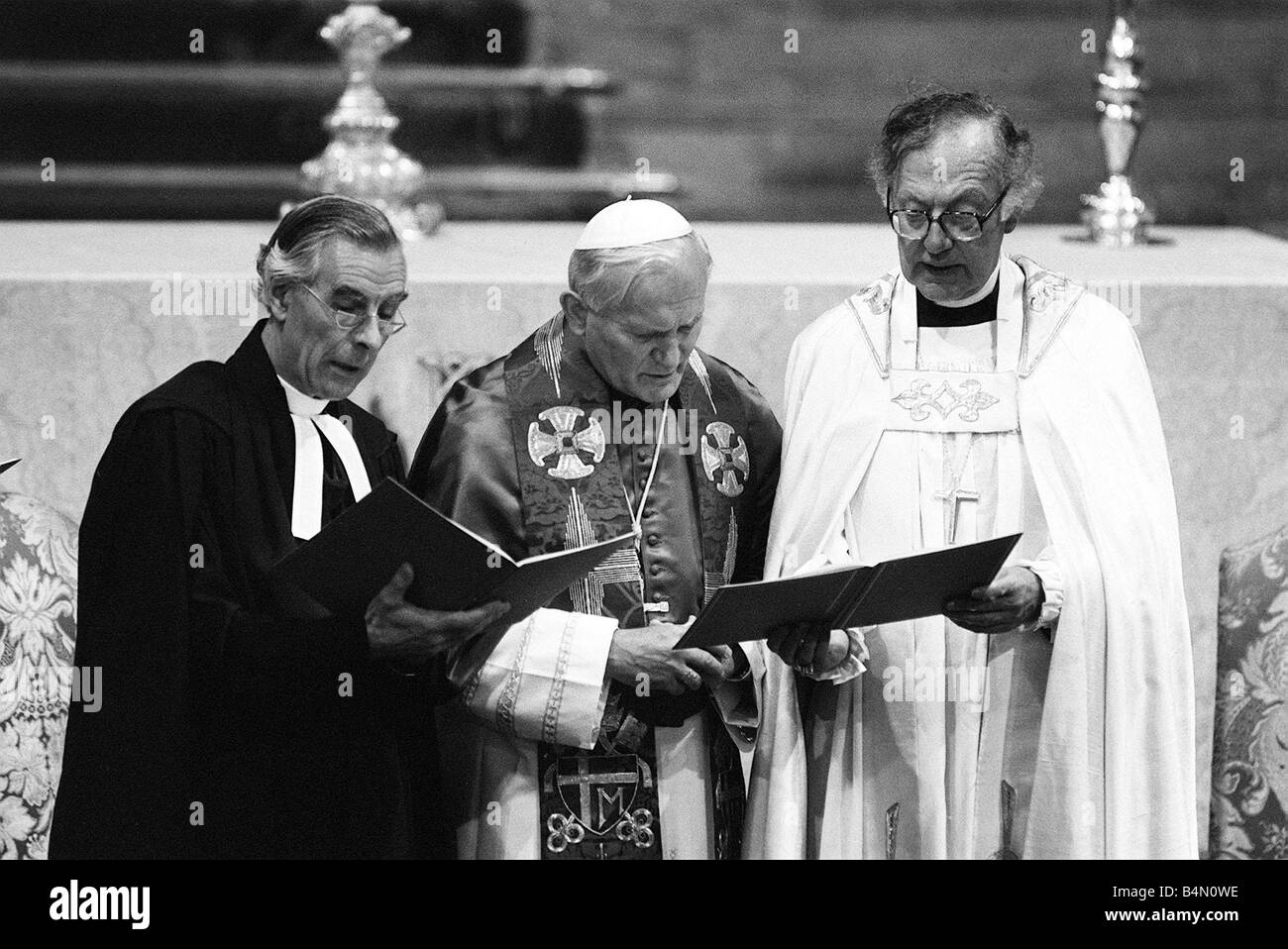 Pope John Paul II during visit to Britain in 1982 conducts a joint ...