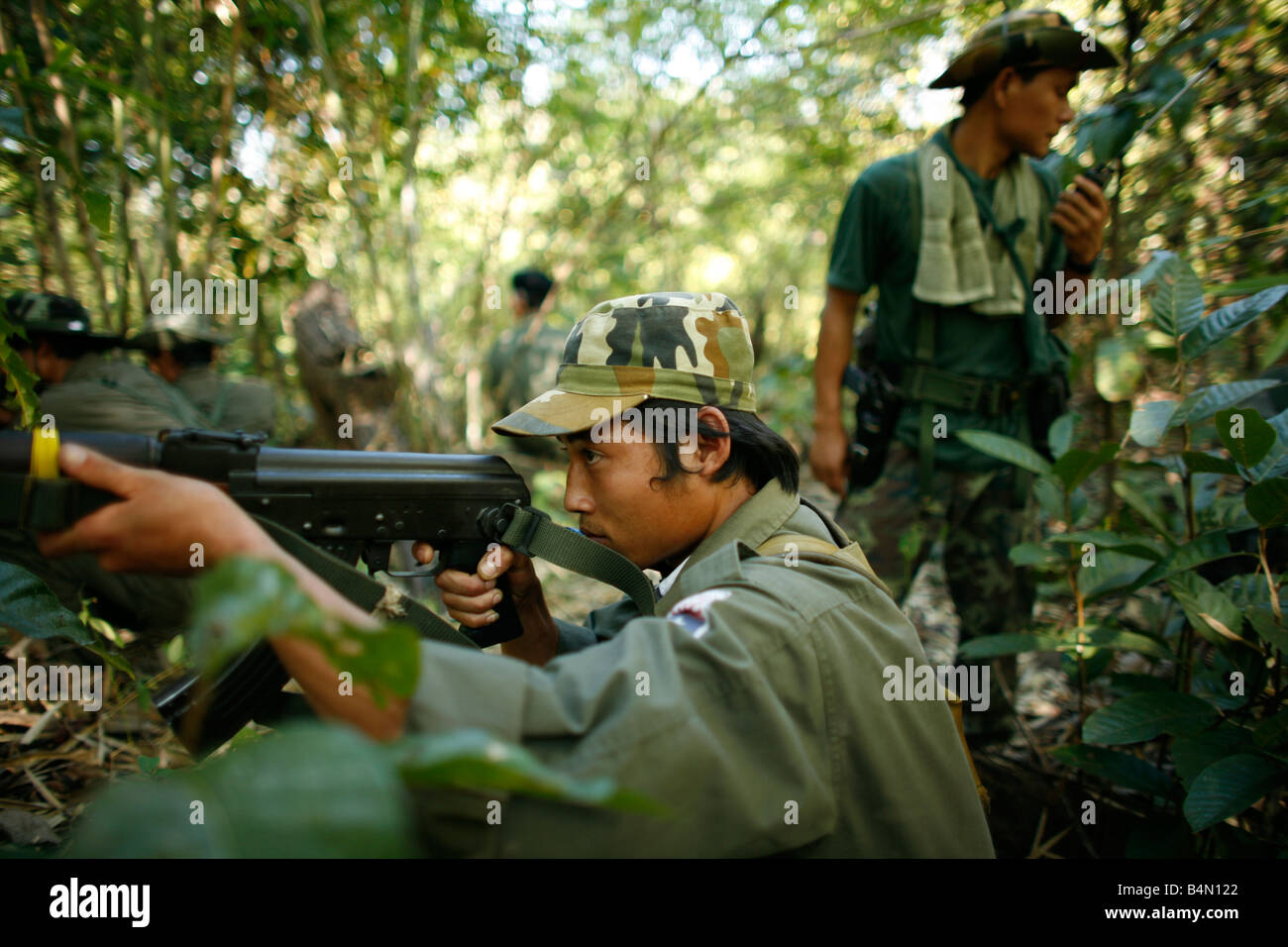 A KNLA soldier takes aim in the jungle around La Per Her In Myanmar ...