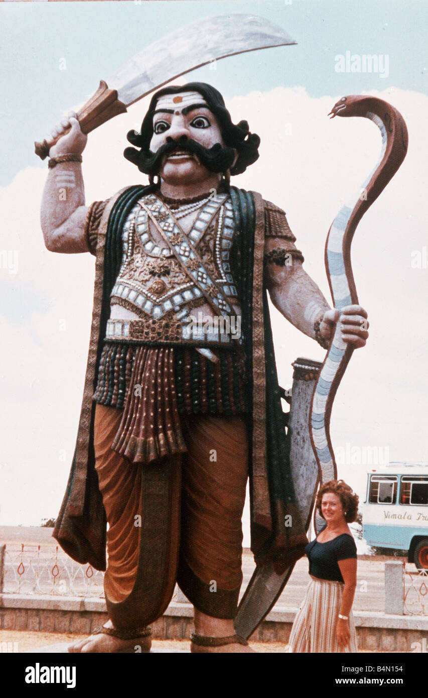 India Demon Mahisha with sword and cobra guards the approach to a hill ...