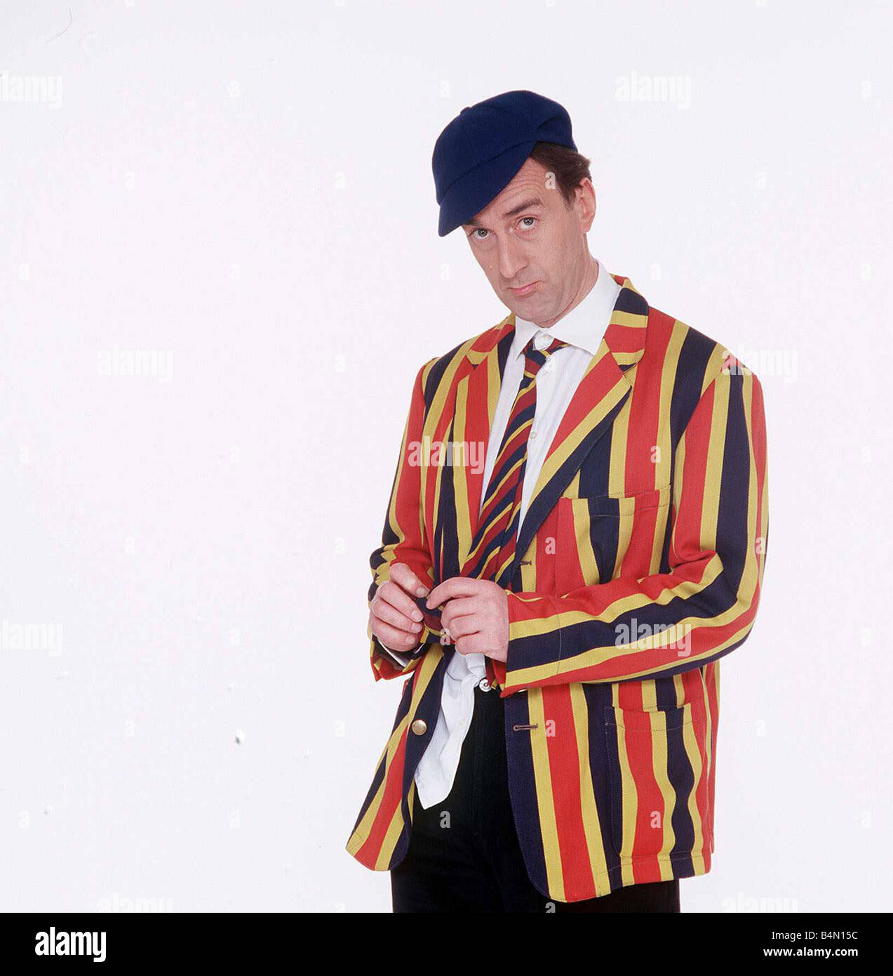 Angus Deayton TV Presenter November 2000 wearing striped school blazer ...