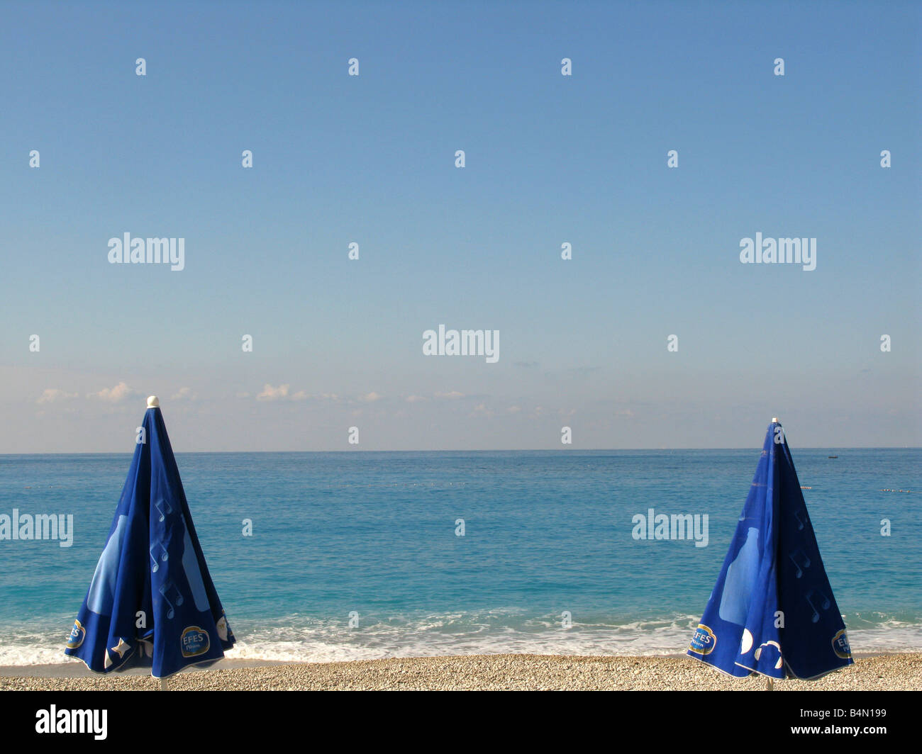 Closed parasols hi-res stock photography and images - Alamy