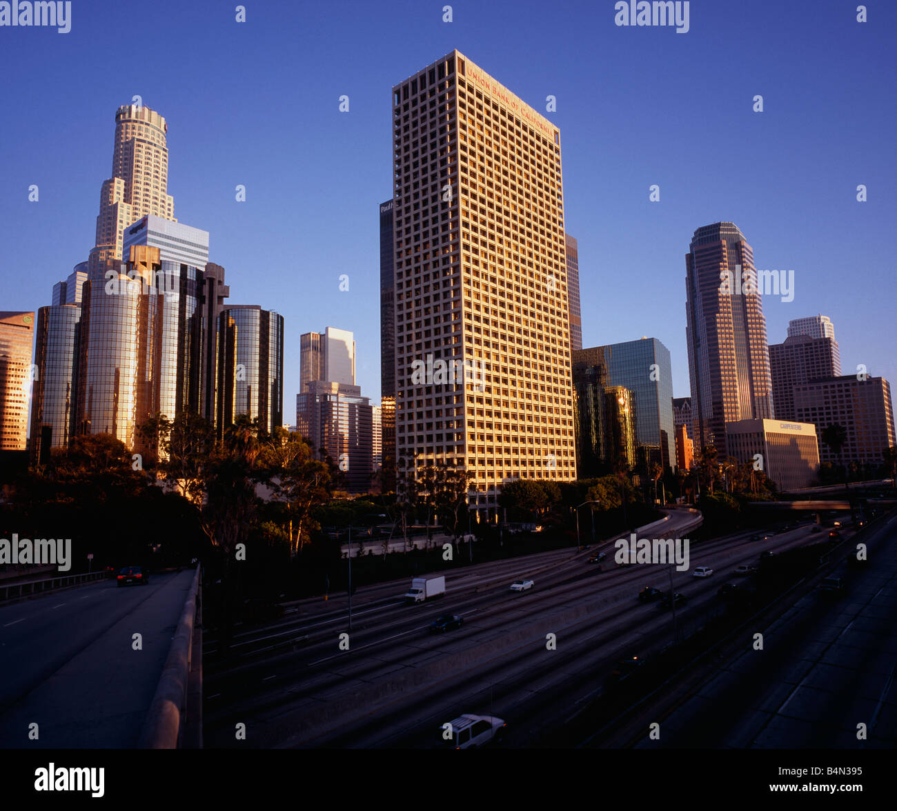 Setting Sun on Down Town Buildings Stock Photo - Alamy