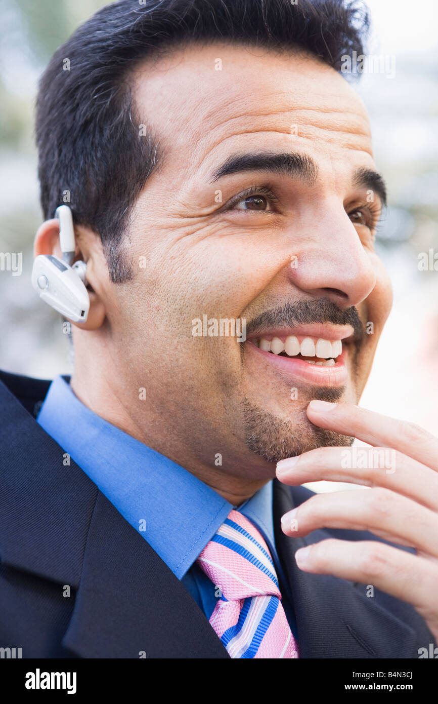 Businessman wearing bluetooth headset hi-res stock photography and ...