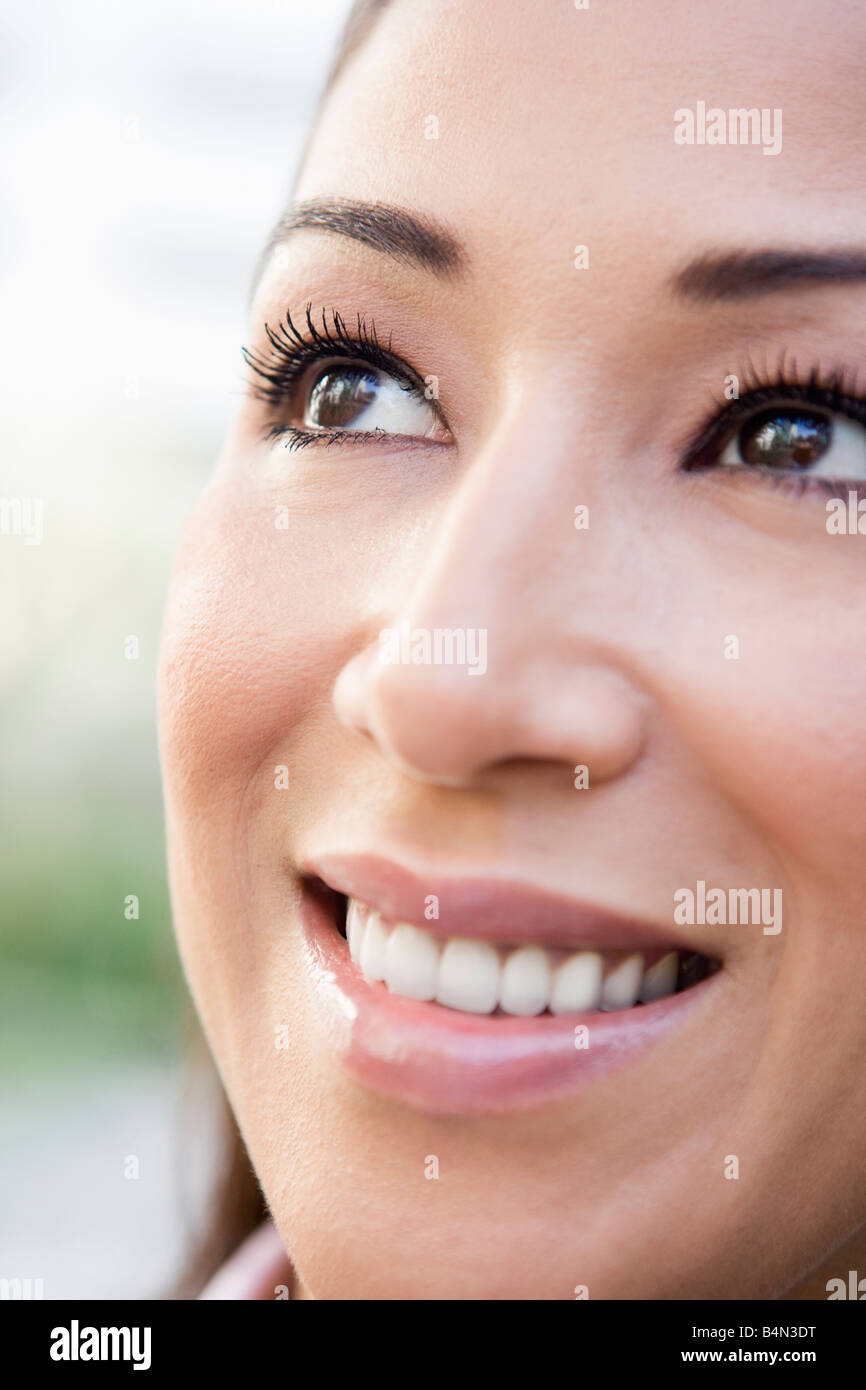 Woman's smiling face outdoors (selective focus Stock Photo - Alamy