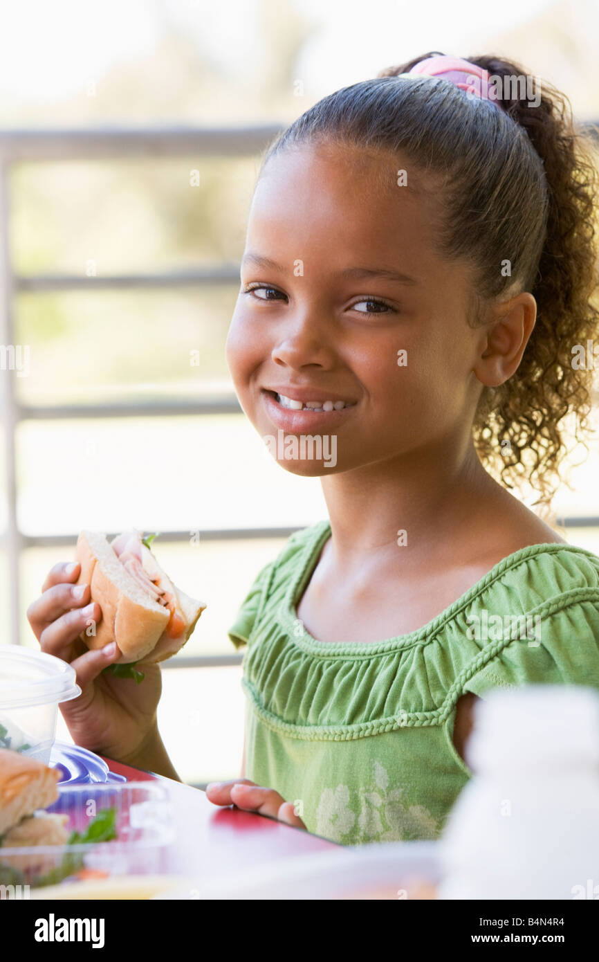 African child eating sandwich hi-res stock photography and images - Alamy