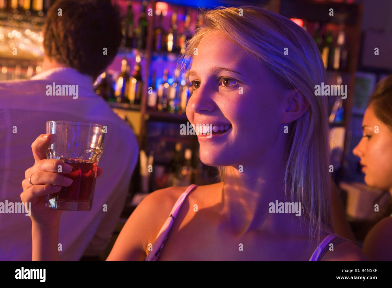 Young people drinking bar hi-res stock photography and images - Alamy