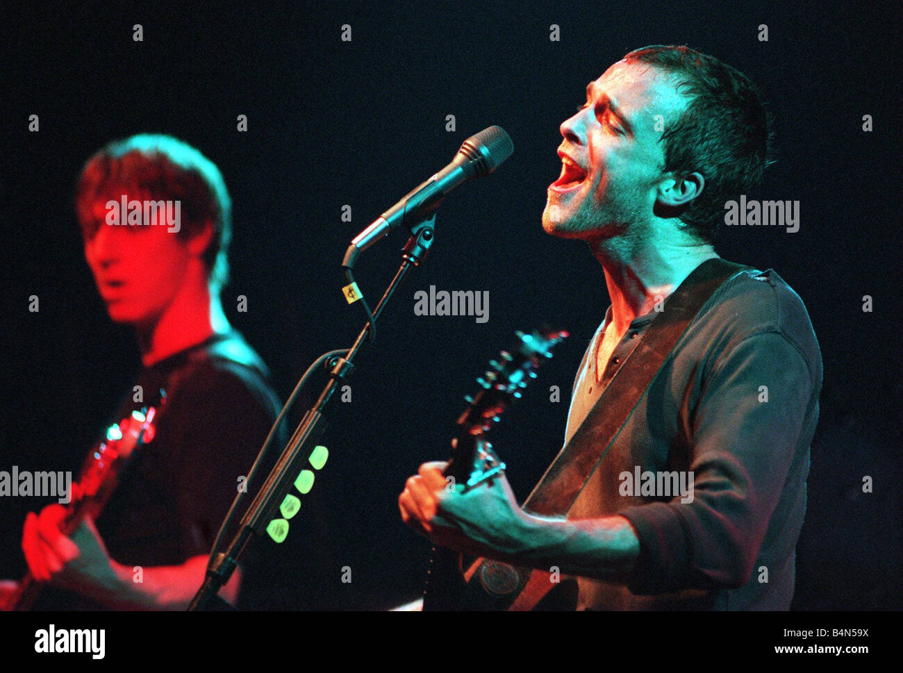 Travis pop group May 2000 in North Carolina USA playing on stage at The ...