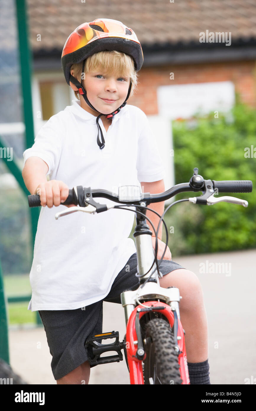 Elementary school boy with bicycle hi-res stock photography and images ...