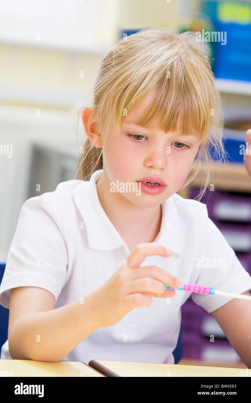 Counting beads in elementary class hi-res stock photography and images ...