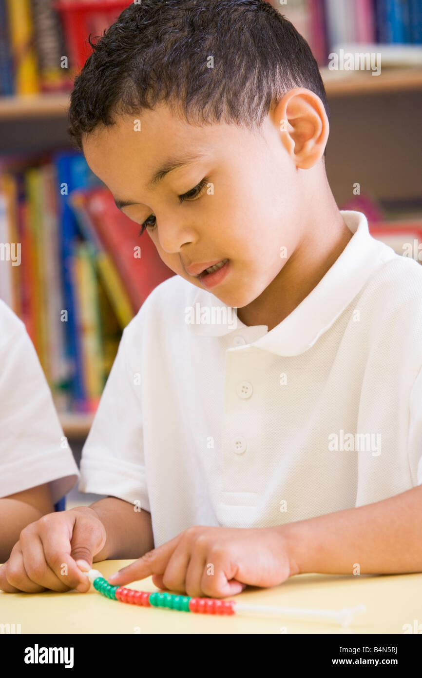 Student in class learning numbers (selective focus Stock Photo - Alamy